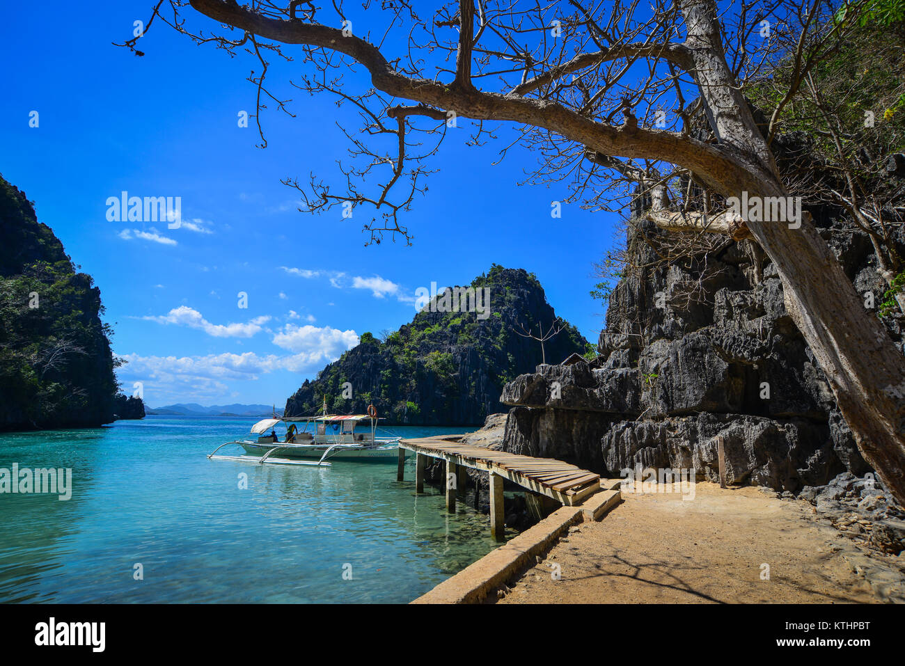 Palawan, Philippines - Apr 11, 2017. A tourist boat docking at jetty in ...
