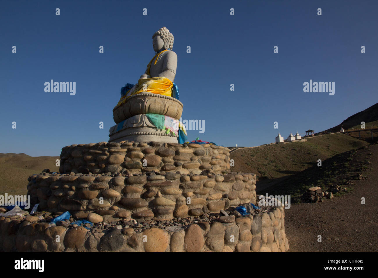 Buddha statue in Sainshand wishing mountain Stock Photo - Alamy