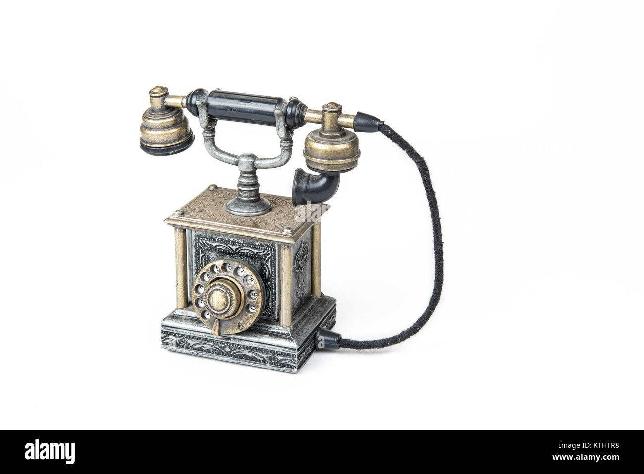 Old retro phone on the white background Stock Photo - Alamy