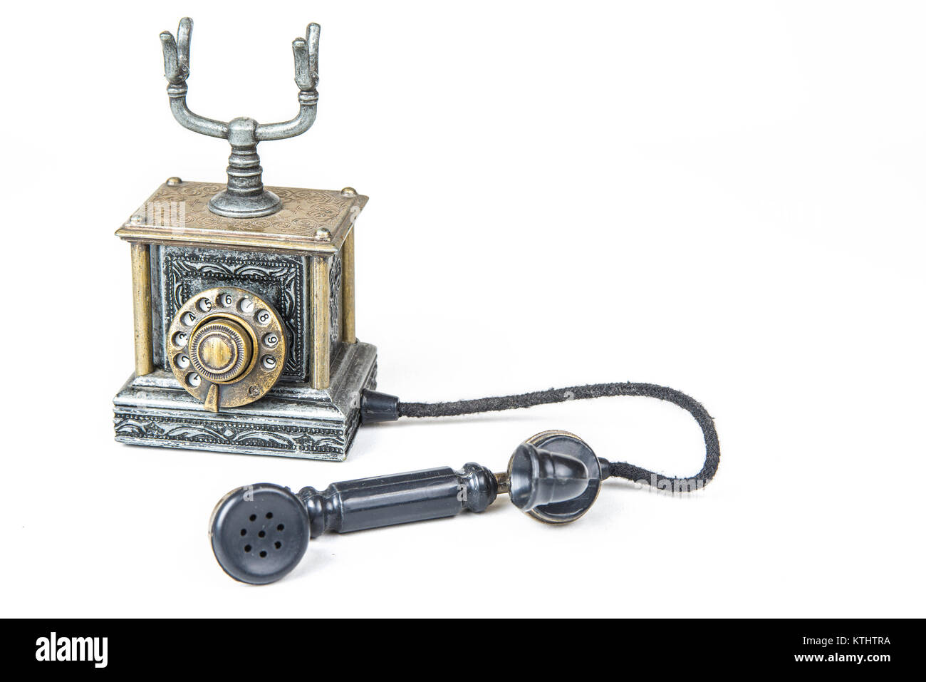 Old retro phone on the white background Stock Photo - Alamy