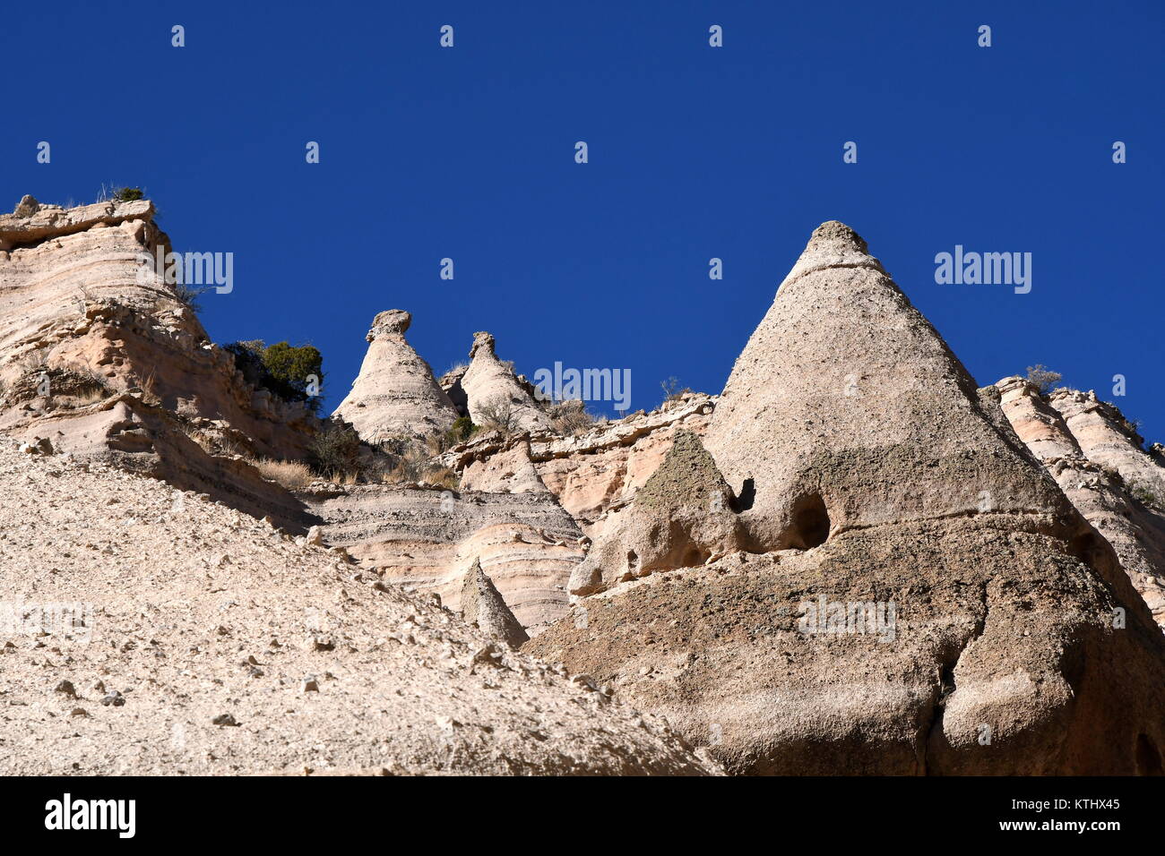 Balanced rocks and tent rocks dominate the scene at Tent Rocks National ...