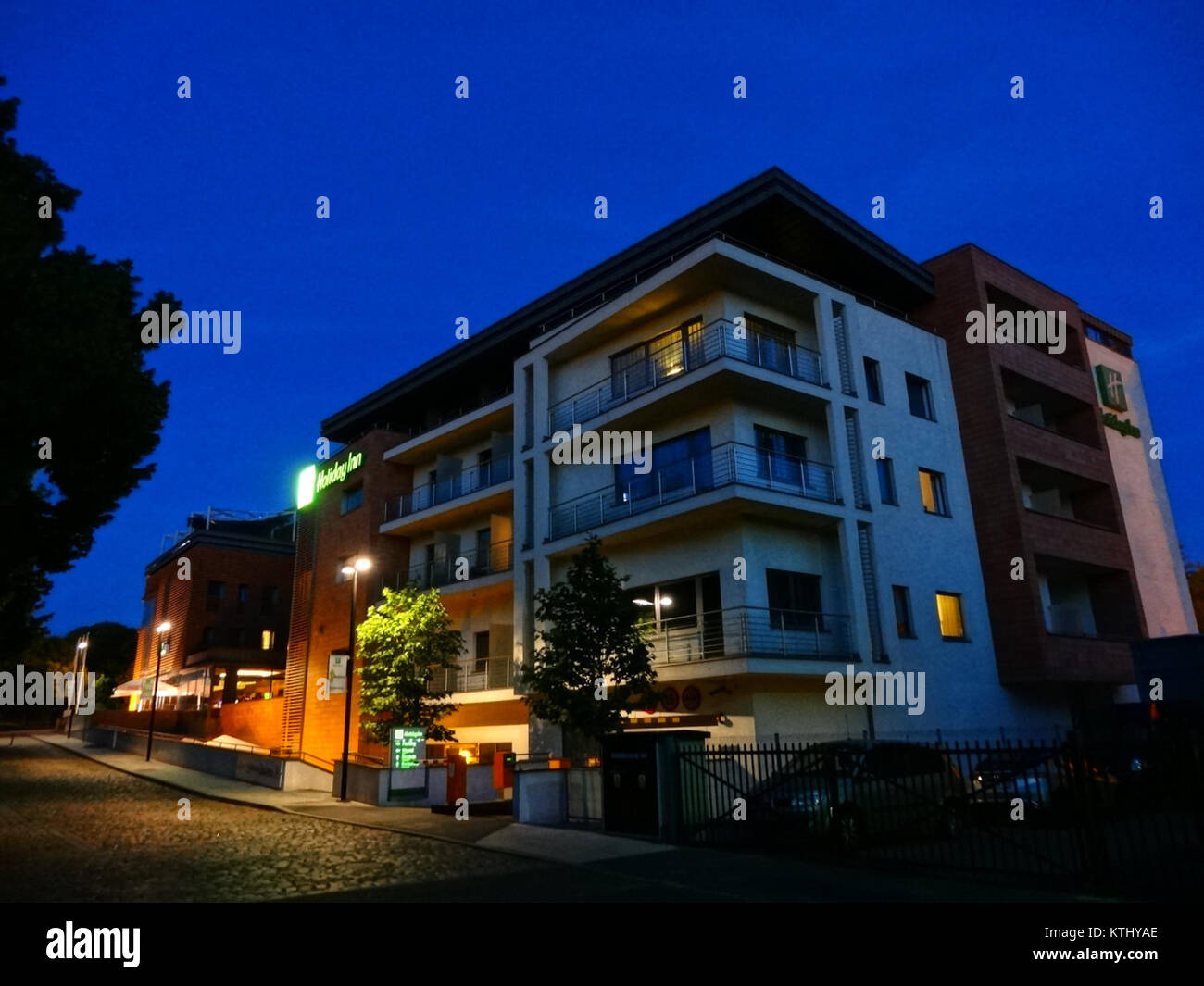 A photograph of the Holiday Inn building from the night of July 1st ...