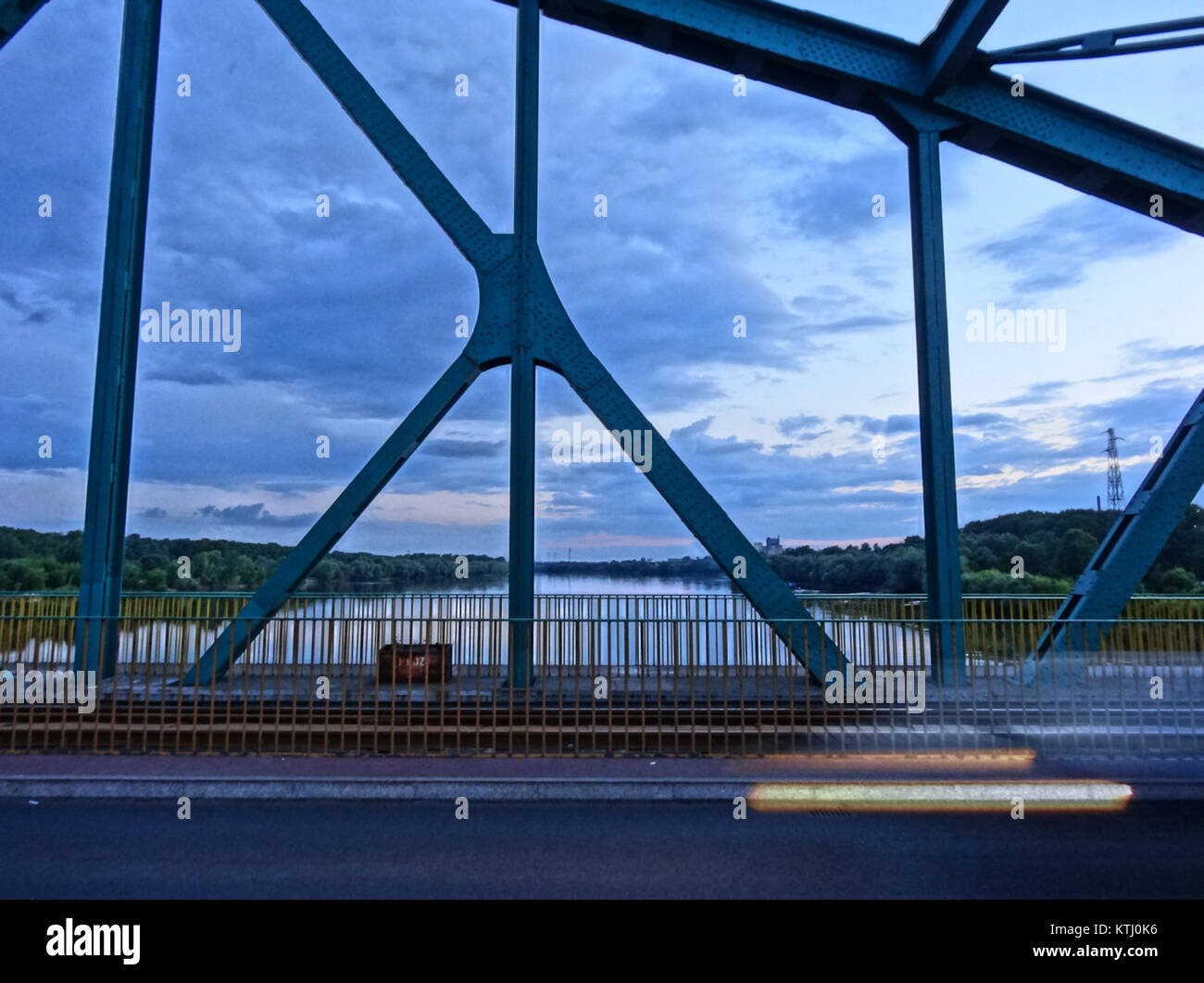 A photograph of a bridge with a view of the Ford, captured at night on ...