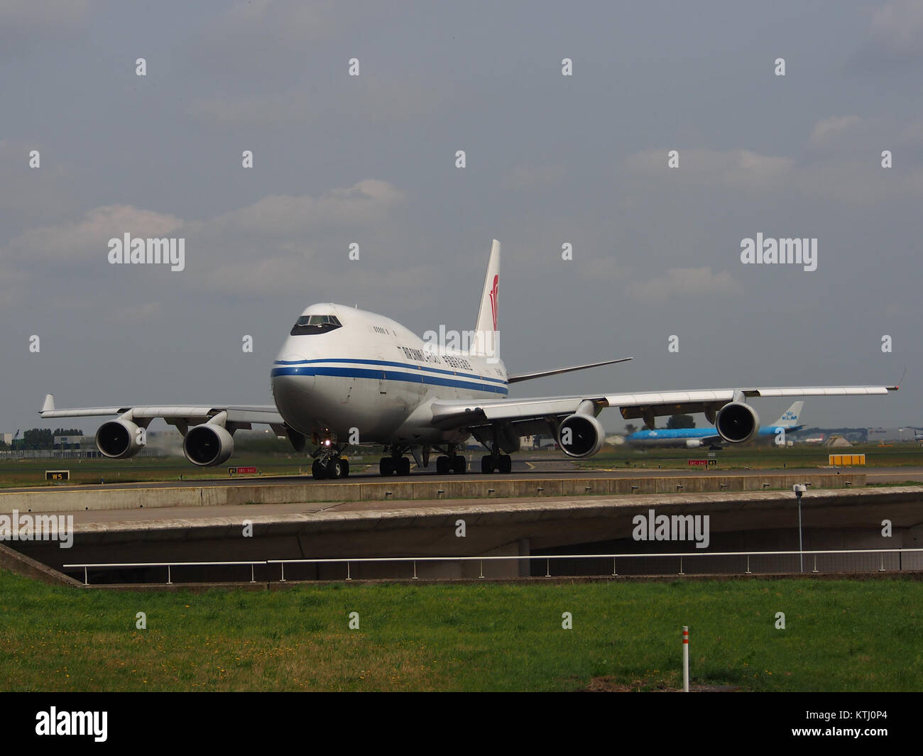 The Air China Cargo Boeing 747-4J6(BCF), with tail number B 2460, is ...
