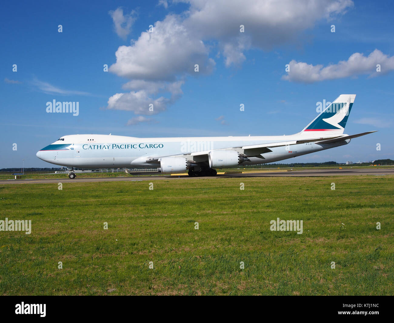 This image shows a Cathay Pacific Boeing 747 867F aircraft ...