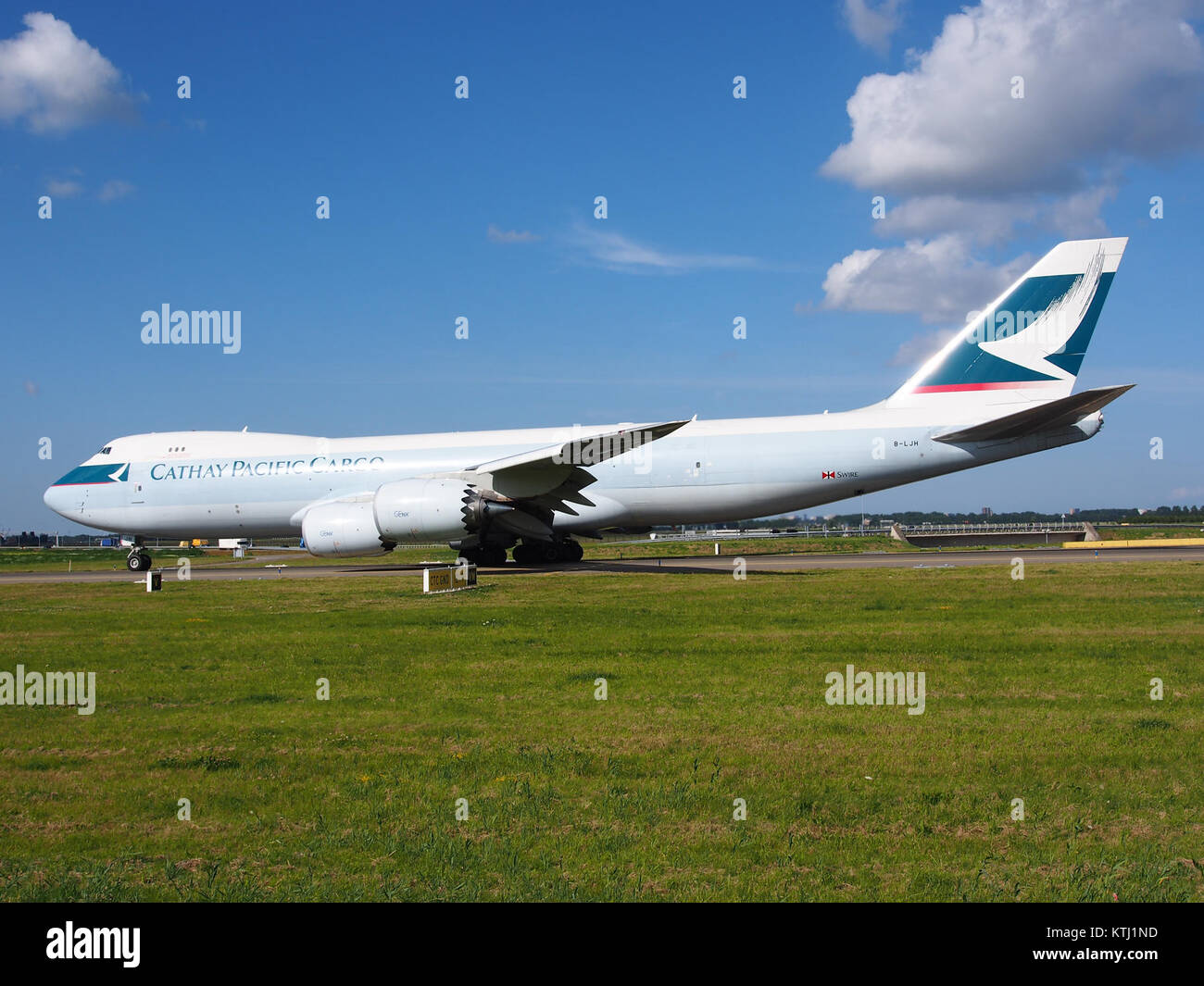 This image shows a Cathay Pacific Boeing 747-867F, with registration B ...