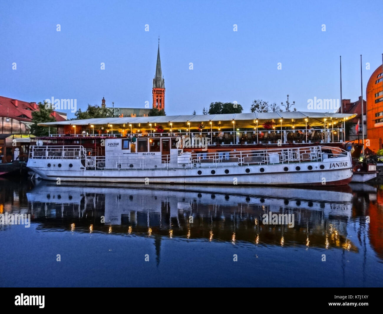 This photograph captures the Brdy River waterfront at night, taken on ...