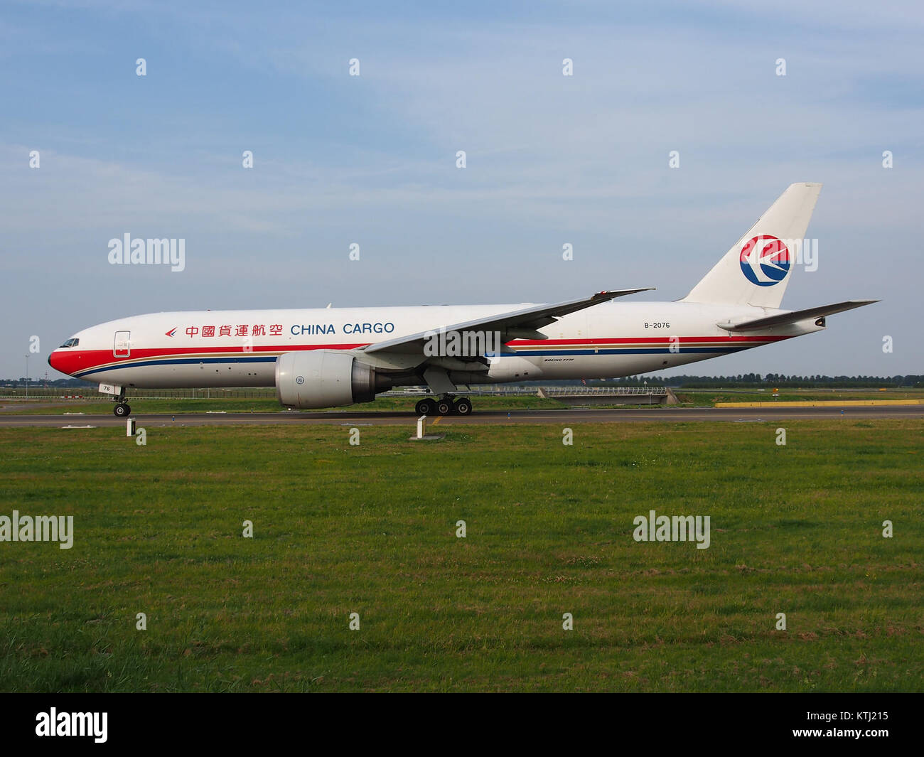 This image captures a Boeing 777F, with the registration B 2076, a ...