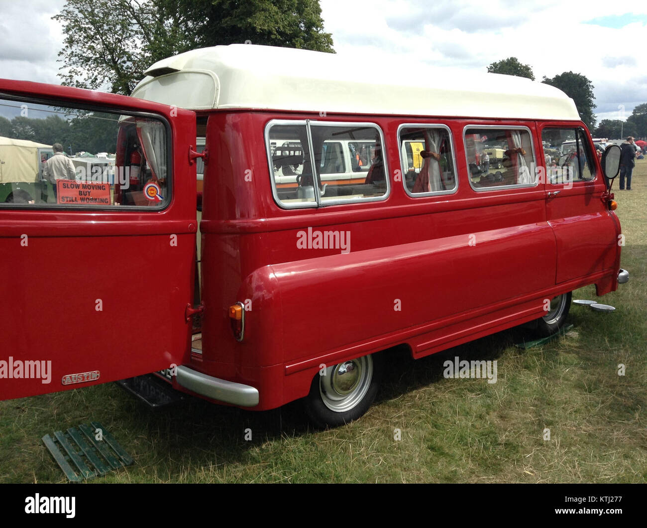 The Austin minibus, captured in this image, showcases a classic vehicle ...