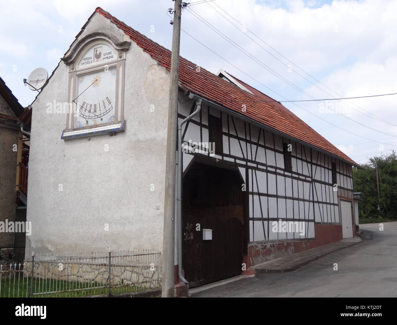 Photograph of a farmhouse with a sundial in Horba, Thuringia, Germany ...