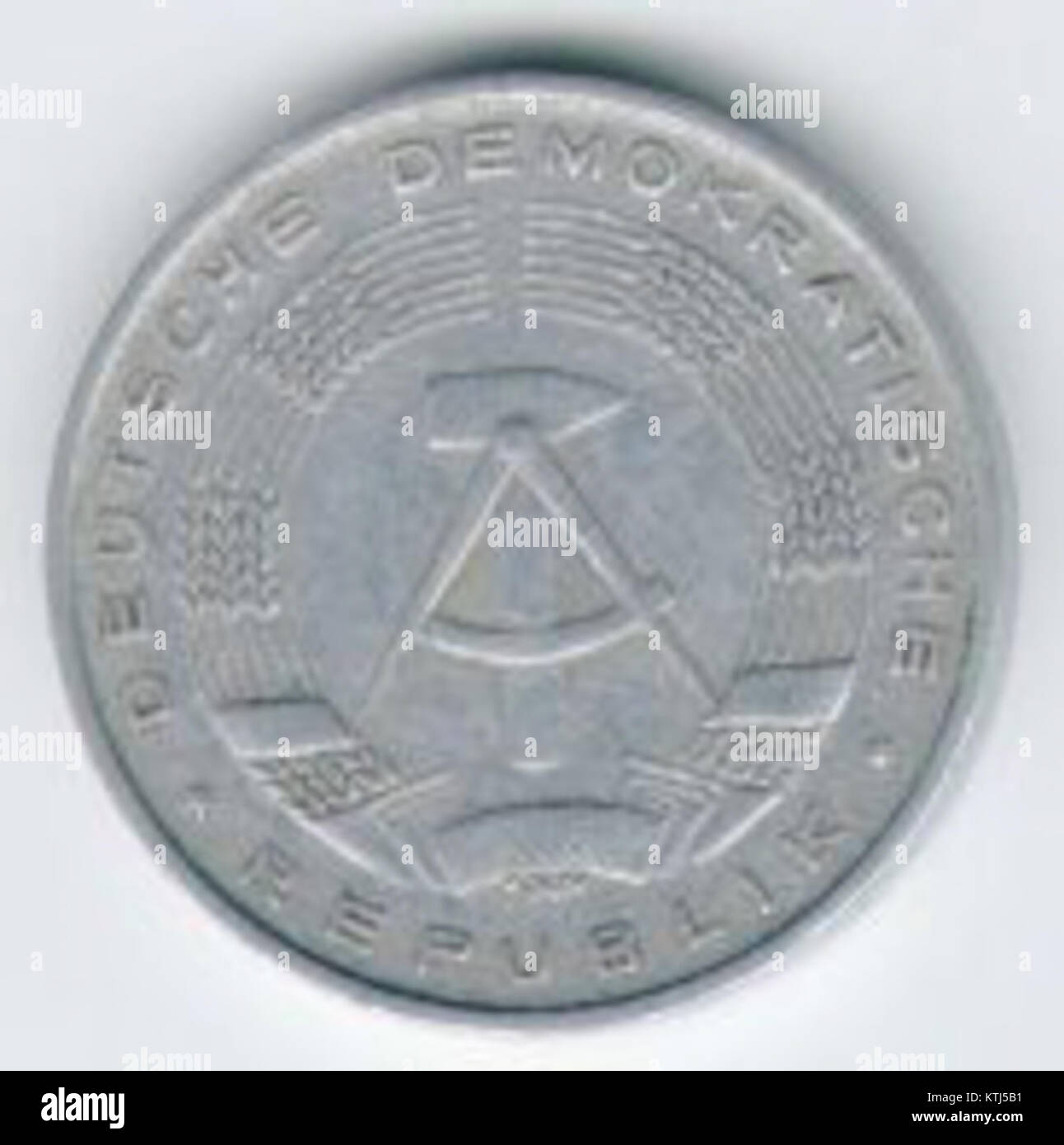 A historical coin from the German Democratic Republic (DDR), featuring ...