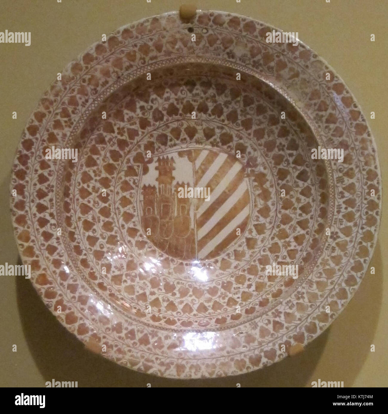This 16th-century Spanish basin is made of glazed earthenware, with ...