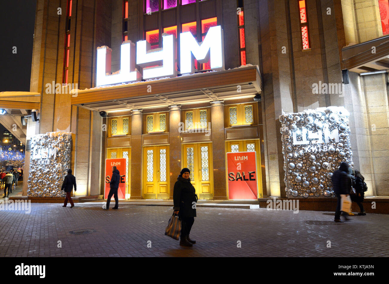 People walking around the new year's decorated TsUM (Central City ...