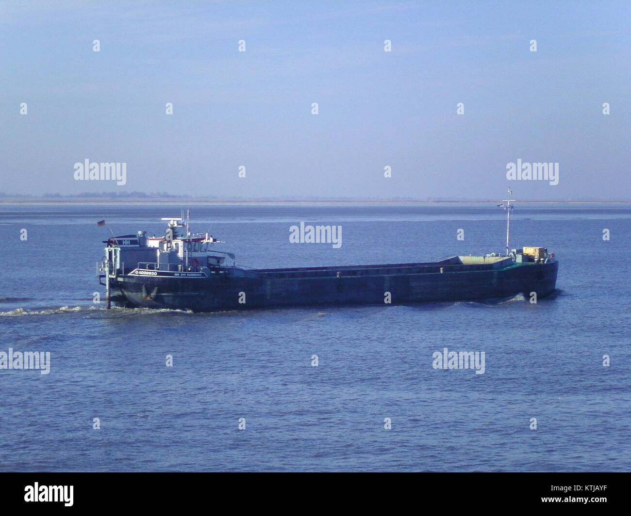 Barge HH 211 refers to a specific vessel, likely used for ...