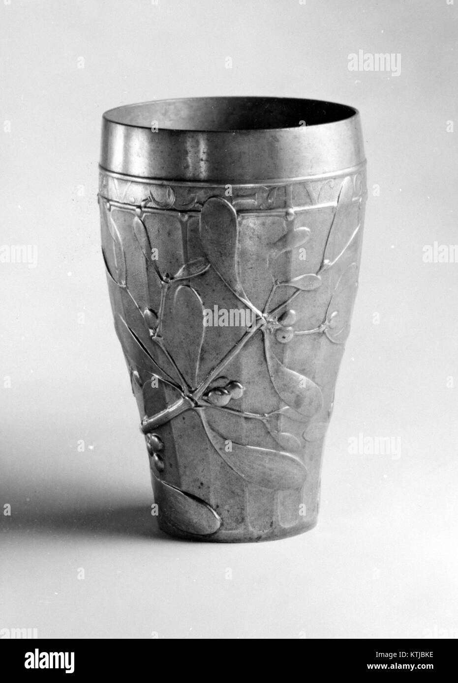 A beaker featuring mistletoe, displayed in the Metropolitan Museum of ...