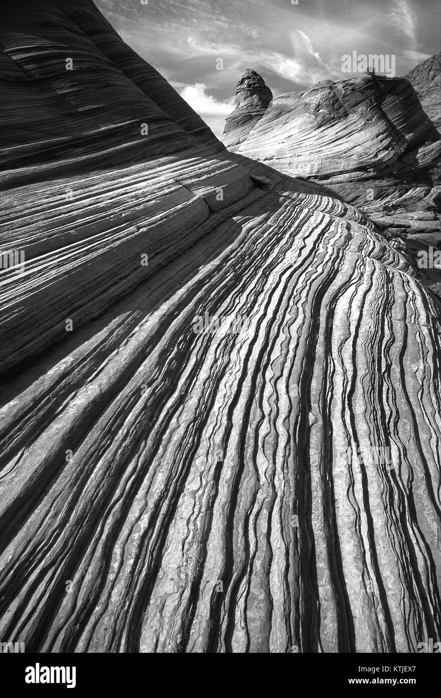 This black-and-white photograph captures the stunning sandstone ...