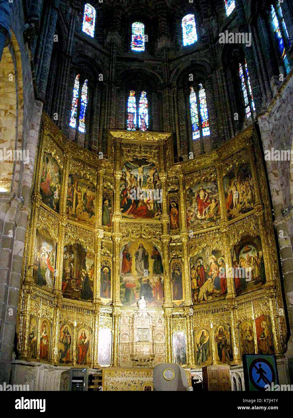 The interior of Avila Cathedral, featuring the main altarpiece (retablo ...
