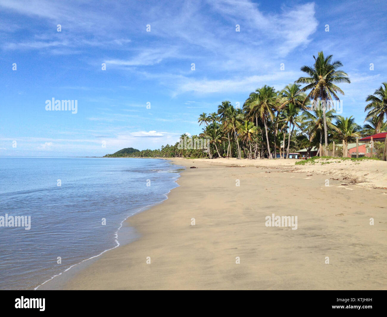 This image showcases a serene beach in Fiji, known for its pristine ...
