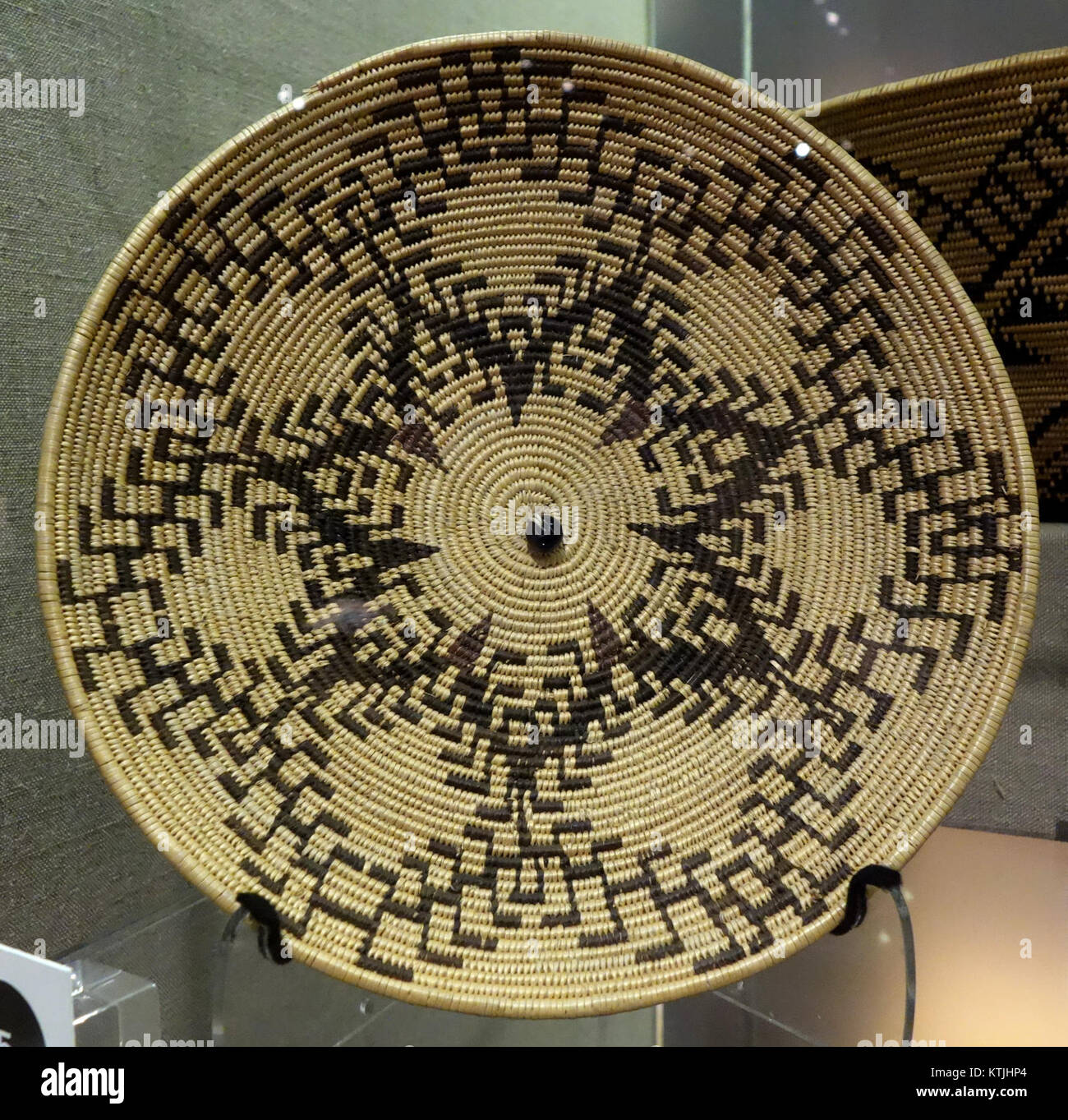 This Maidu basket plate, crafted by Mollie Foreman around 1910, is part ...