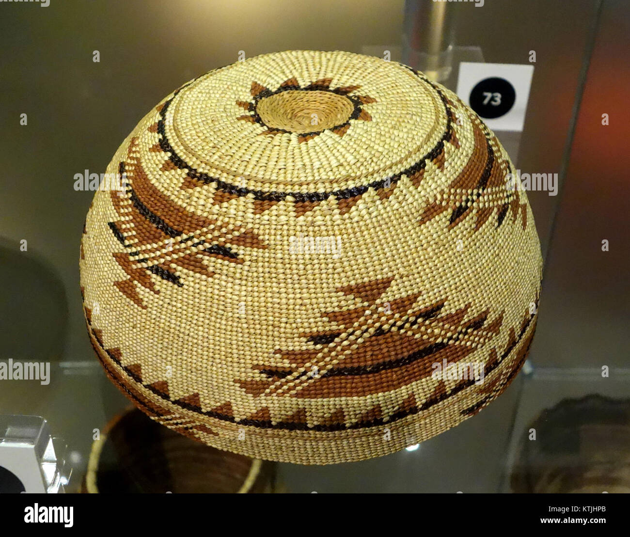 Photograph of a traditional basket hat made from pine root, beargrass ...