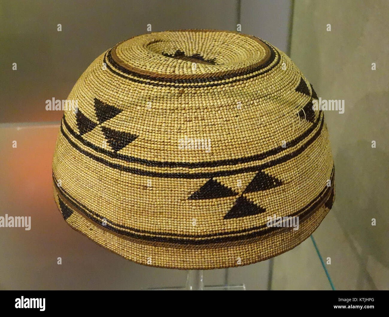 A basket hat from Hoopa, made before 1927, crafted with willow and ...