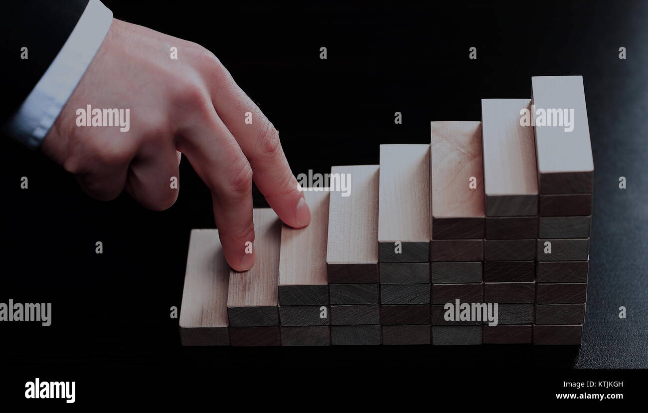 Hand climbing stairs made by wooden blocks Stock Photo - Alamy