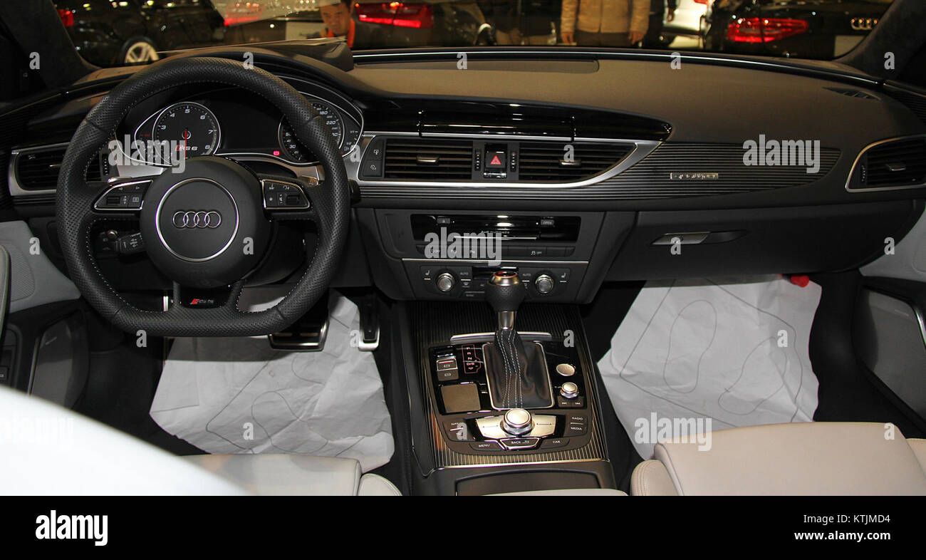 The interior of the Audi RS6 Avant C7 is designed with high-end materials and advanced ...