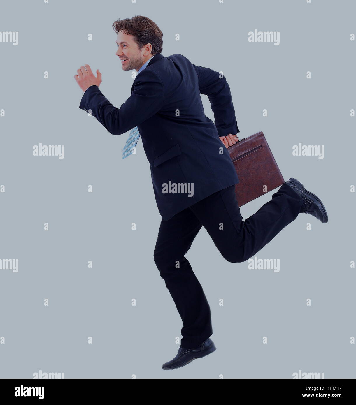 young business man running isolated on white background Stock Photo - Alamy