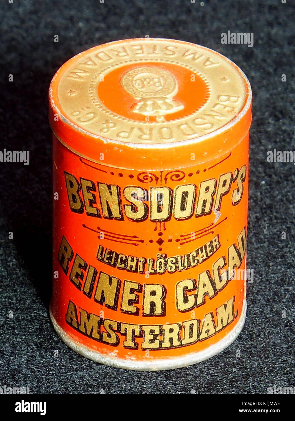 A photograph of an orange, round tin can labeled 'Bensdorps Leicht ...