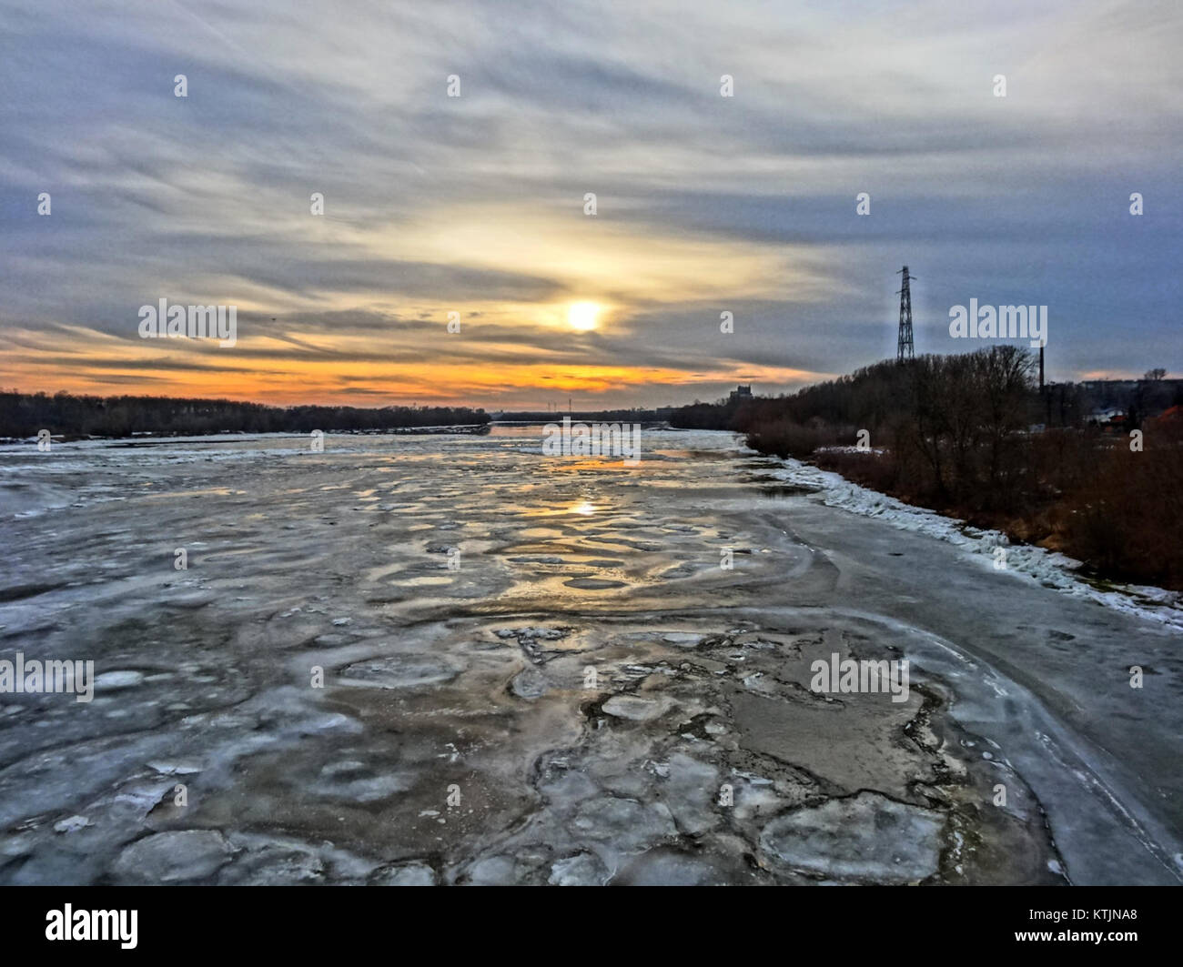 The photograph titled *Bdg Vistula Sunset 3 02 2014* captures a sunset ...