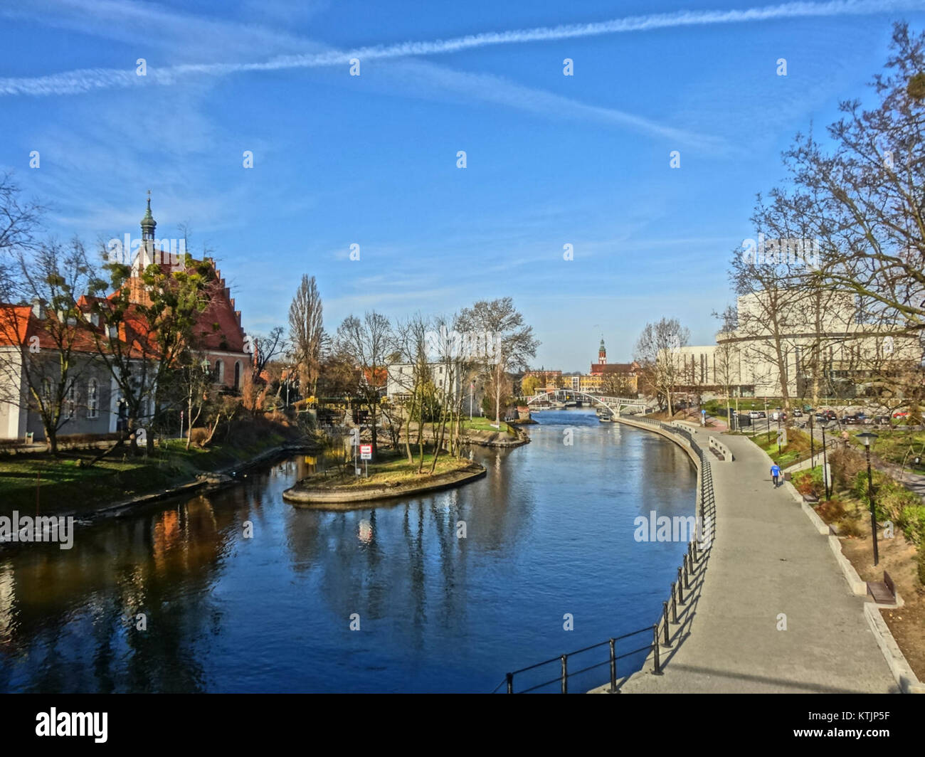 This image captures the view of a bridge from a building on St. Street ...