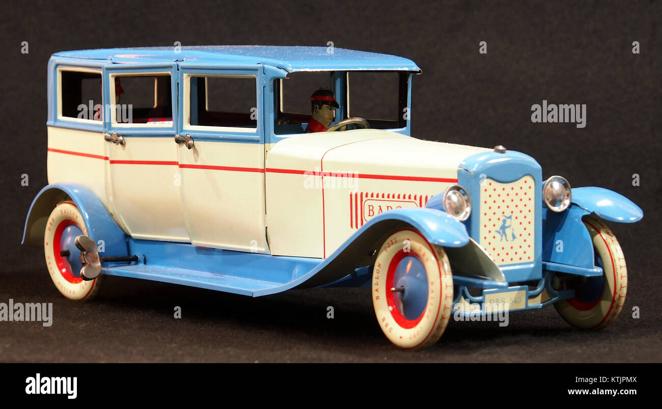 A Baron lithograph tin car is a vintage collectible car that features ...