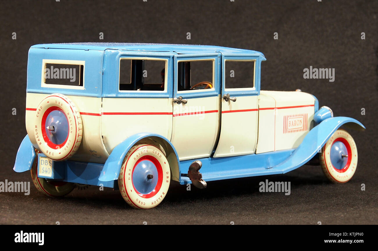 An image of a lithographed tin car by Baron, showcasing its design and ...