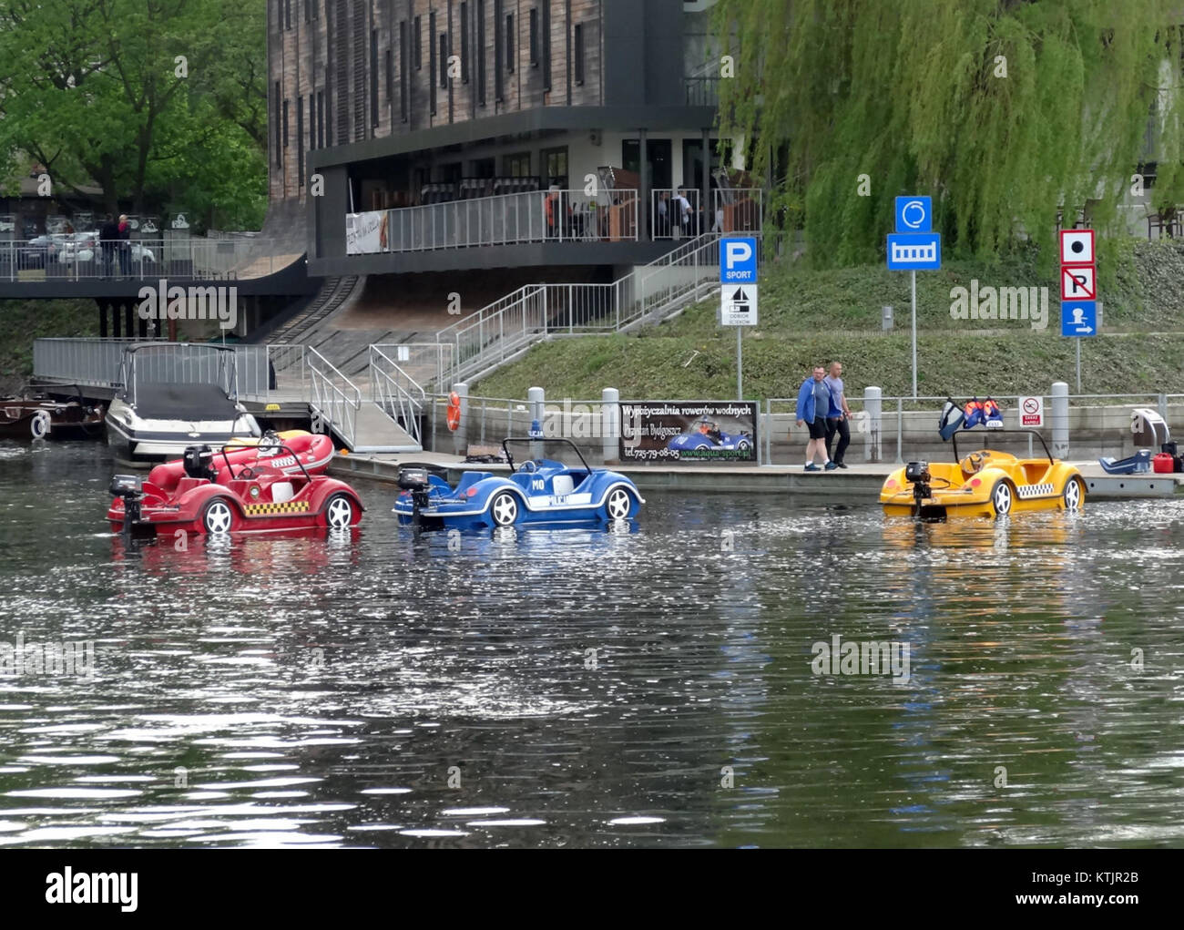 This image shows a marina building in 2014, likely a modern structure ...