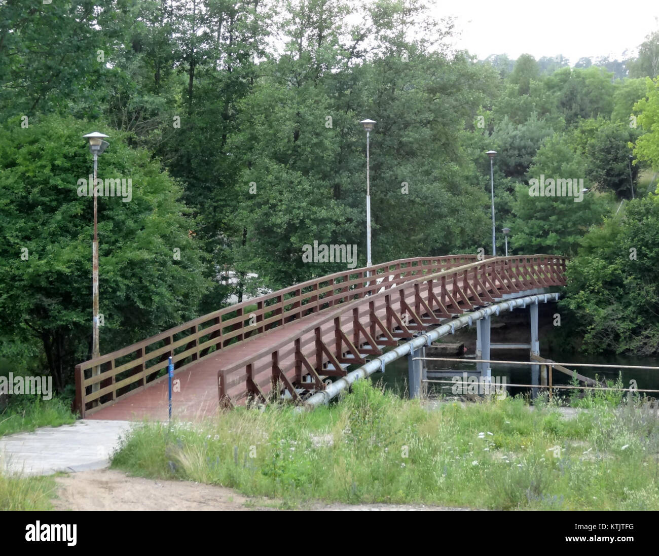 The photograph depicts the Oplawiec footbridge in Bydgoszcz, Poland ...