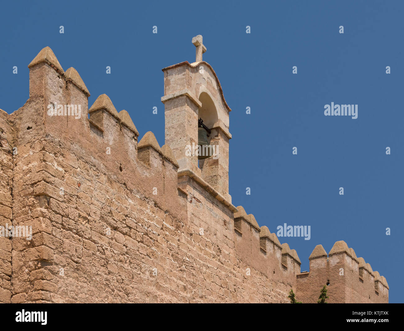 The bell gable and wall of the Alcazaba in Almeria, Spain, an ancient ...