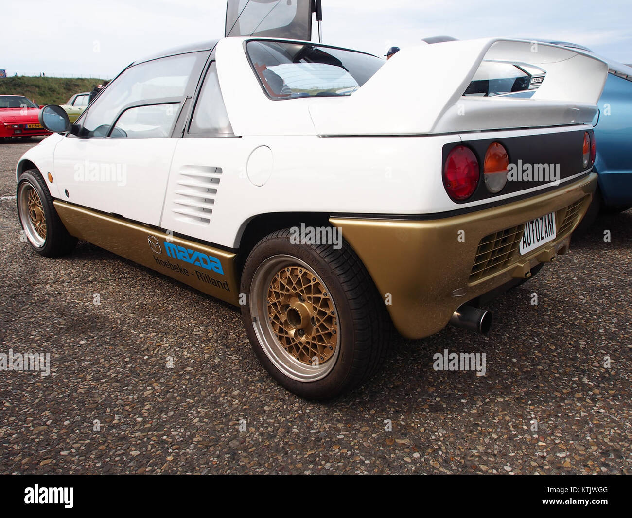 The Autozam AZ-1, featured in picture 8, is a compact sports car ...