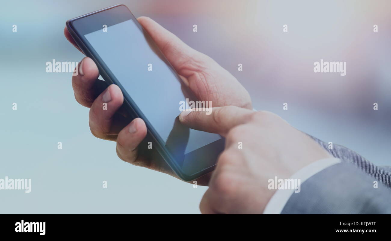 Man hand holding phone Stock Photo - Alamy