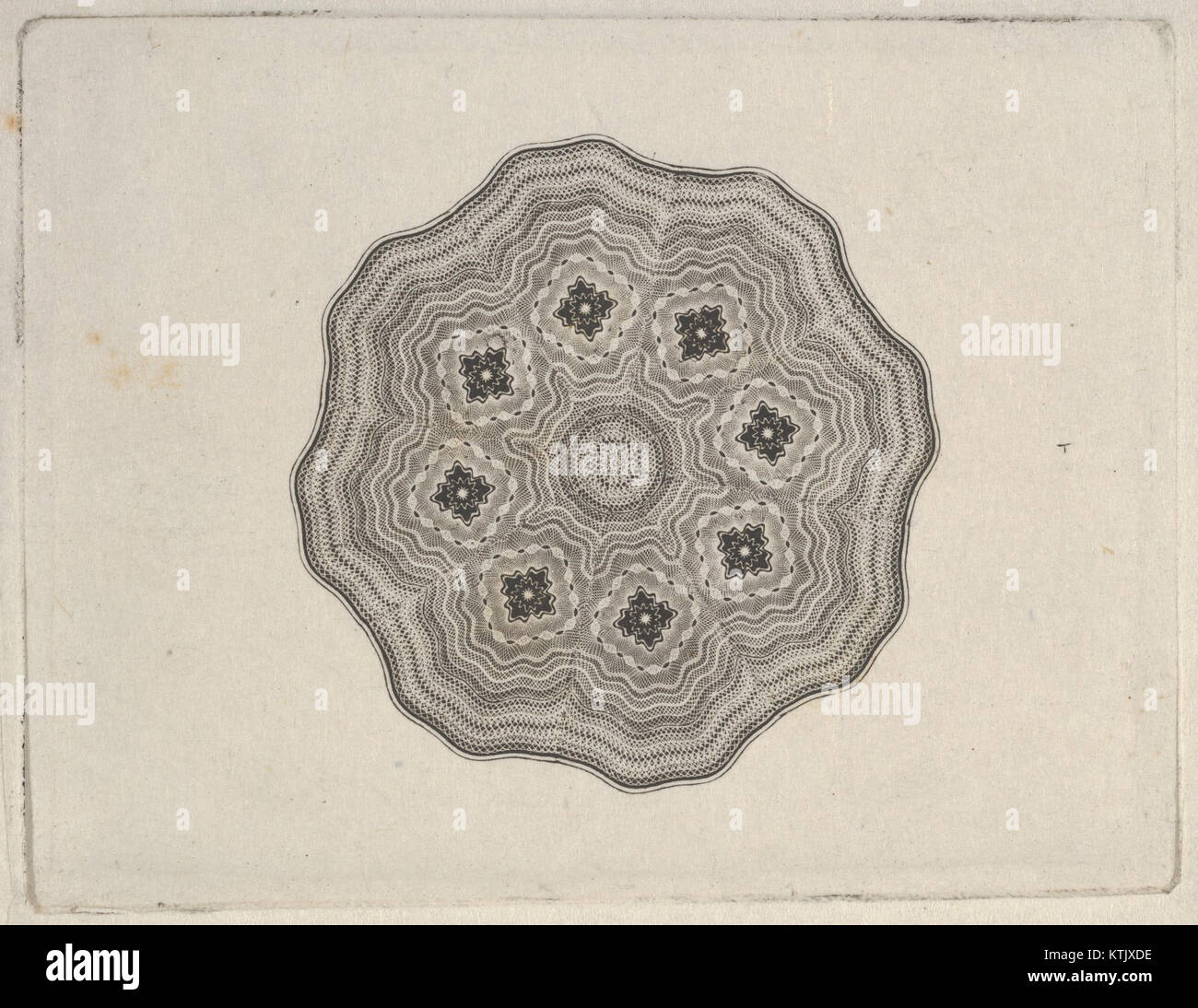 This design showcases a rounded ornamental motif created with lathe ...