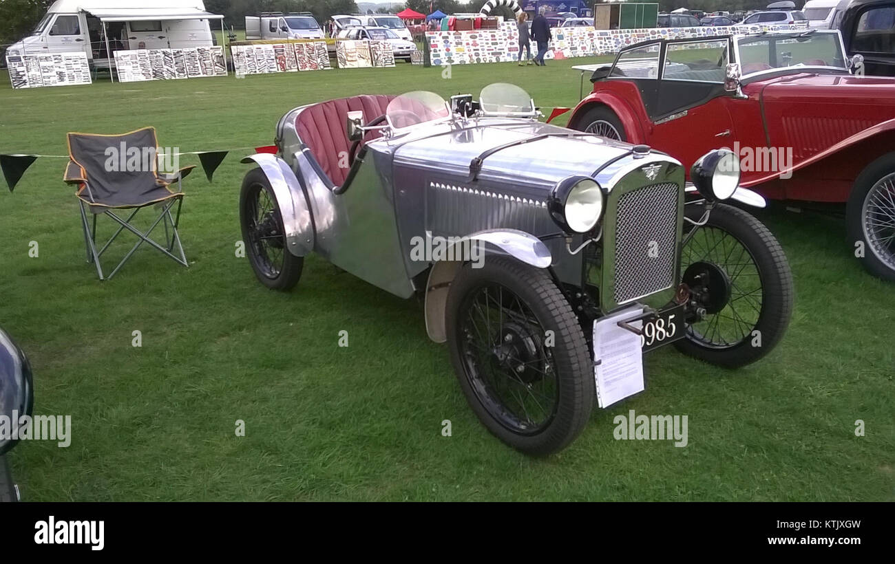 A photograph of an Austin vehicle, likely a classic model. Austin was a ...