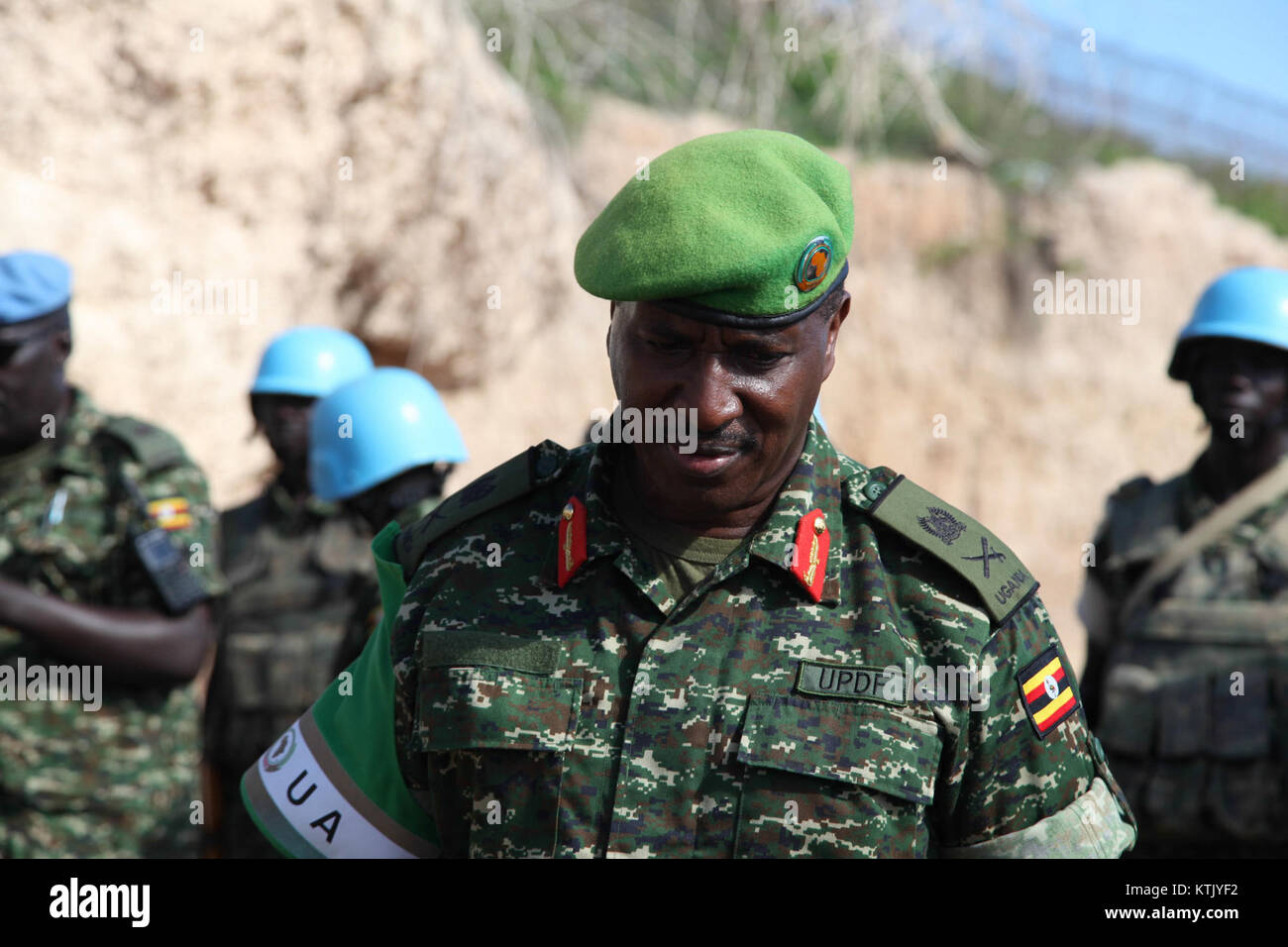 This image captures a stunning sunset over the coastal town of Barawe ...