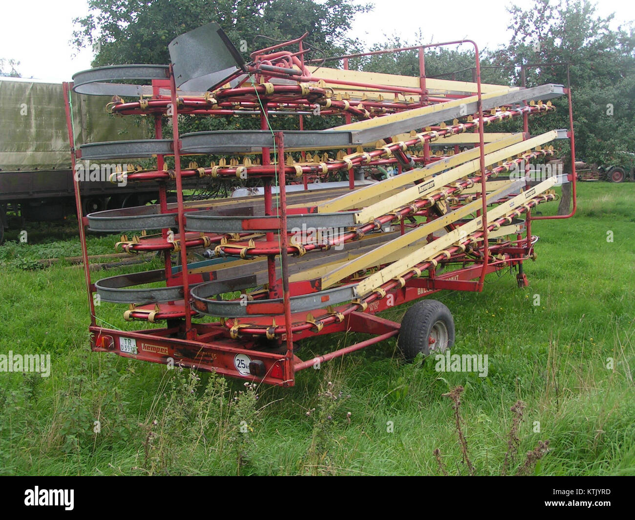 An image of a Ballensammelwagen, a type of hay bale collector used in ...