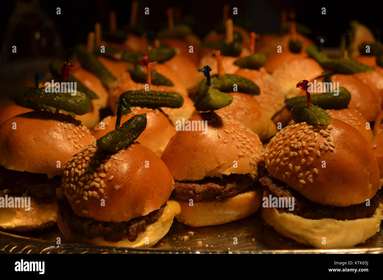 Beef mini burgers are small, bite-sized sandwiches made with beef ...