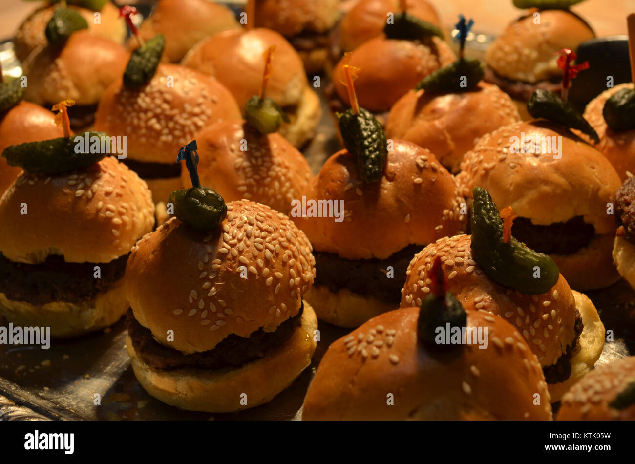 Mini beef burgers are small, bite-sized sandwiches made with seasoned ...