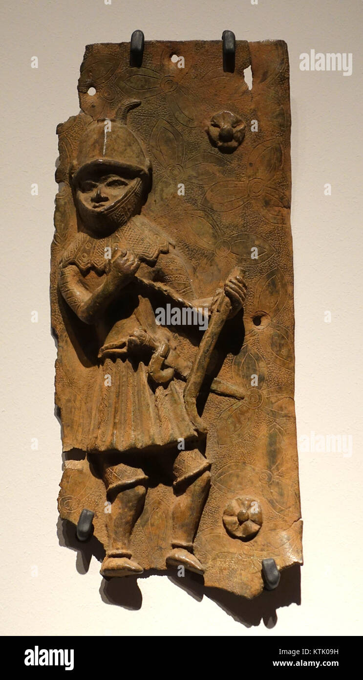 This Benin plaque, displayed at the Ethnological Museum in Berlin, is a ...