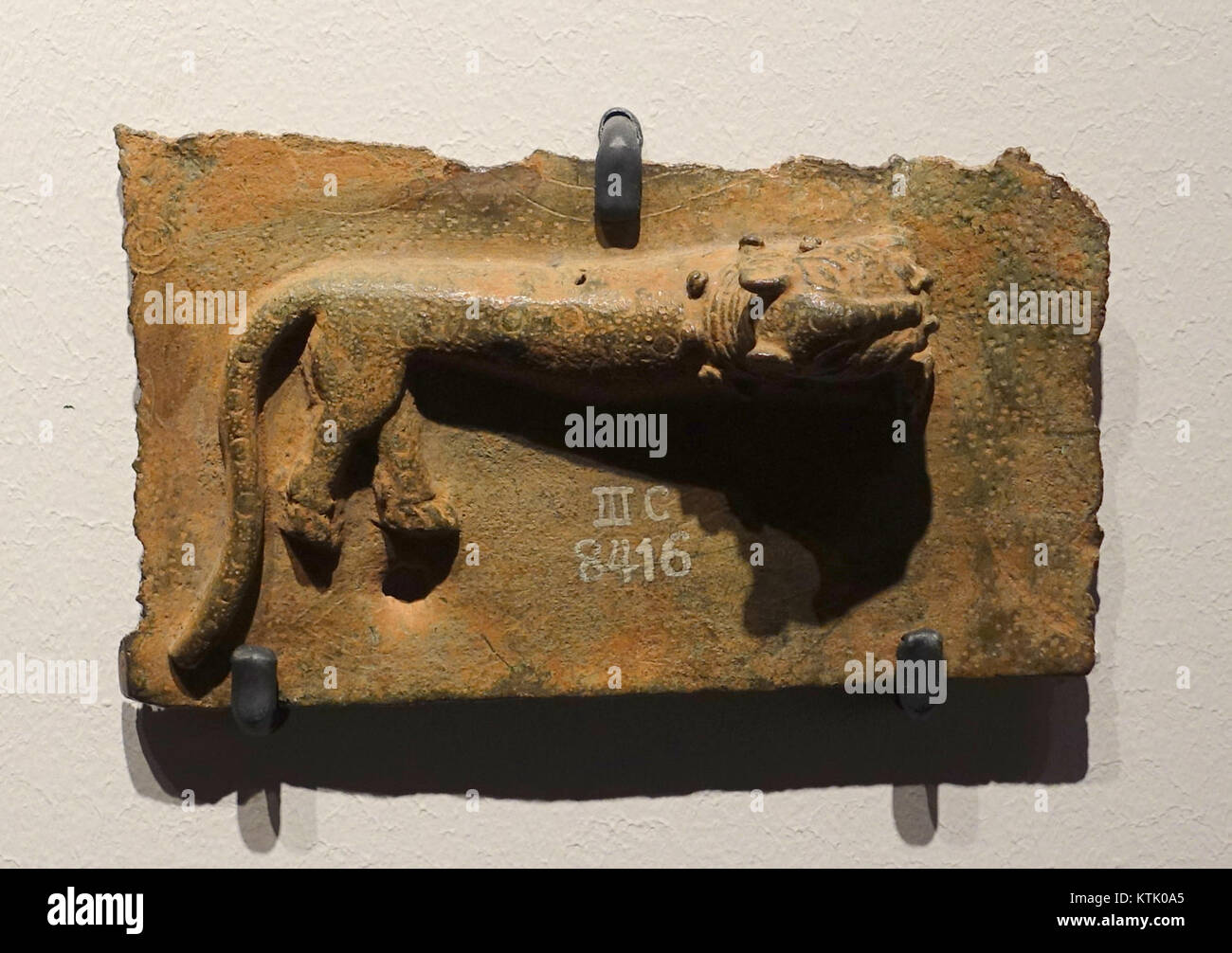 A Benin plaque, displayed at the Ethnological Museum in Berlin ...