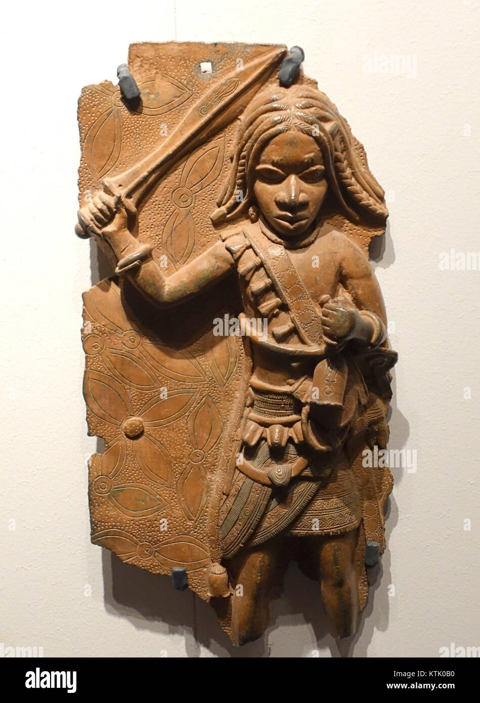 The Benin plaque, housed at the Ethnological Museum in Berlin, is a ...