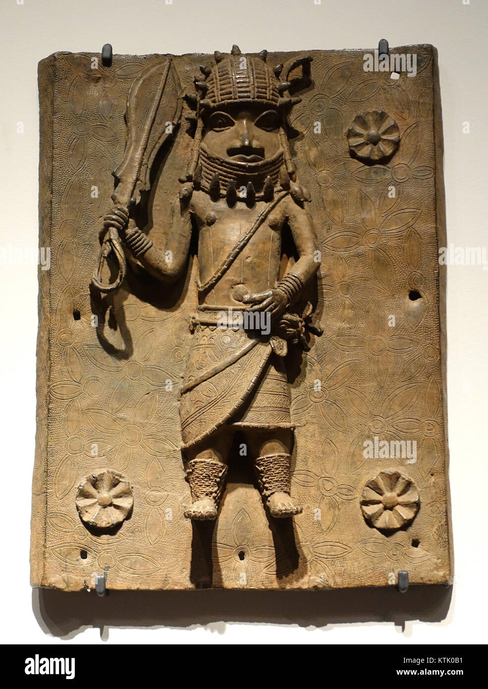 This Benin plaque, located in the Ethnological Museum in Berlin, is a ...