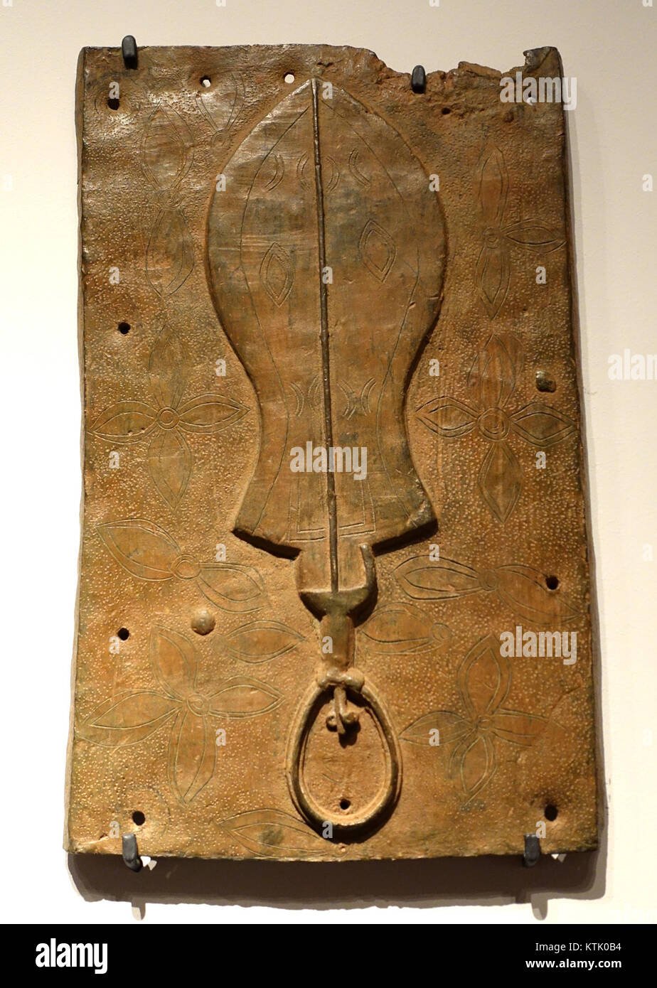This Benin plaque, housed in the Ethnological Museum of Berlin, is a ...