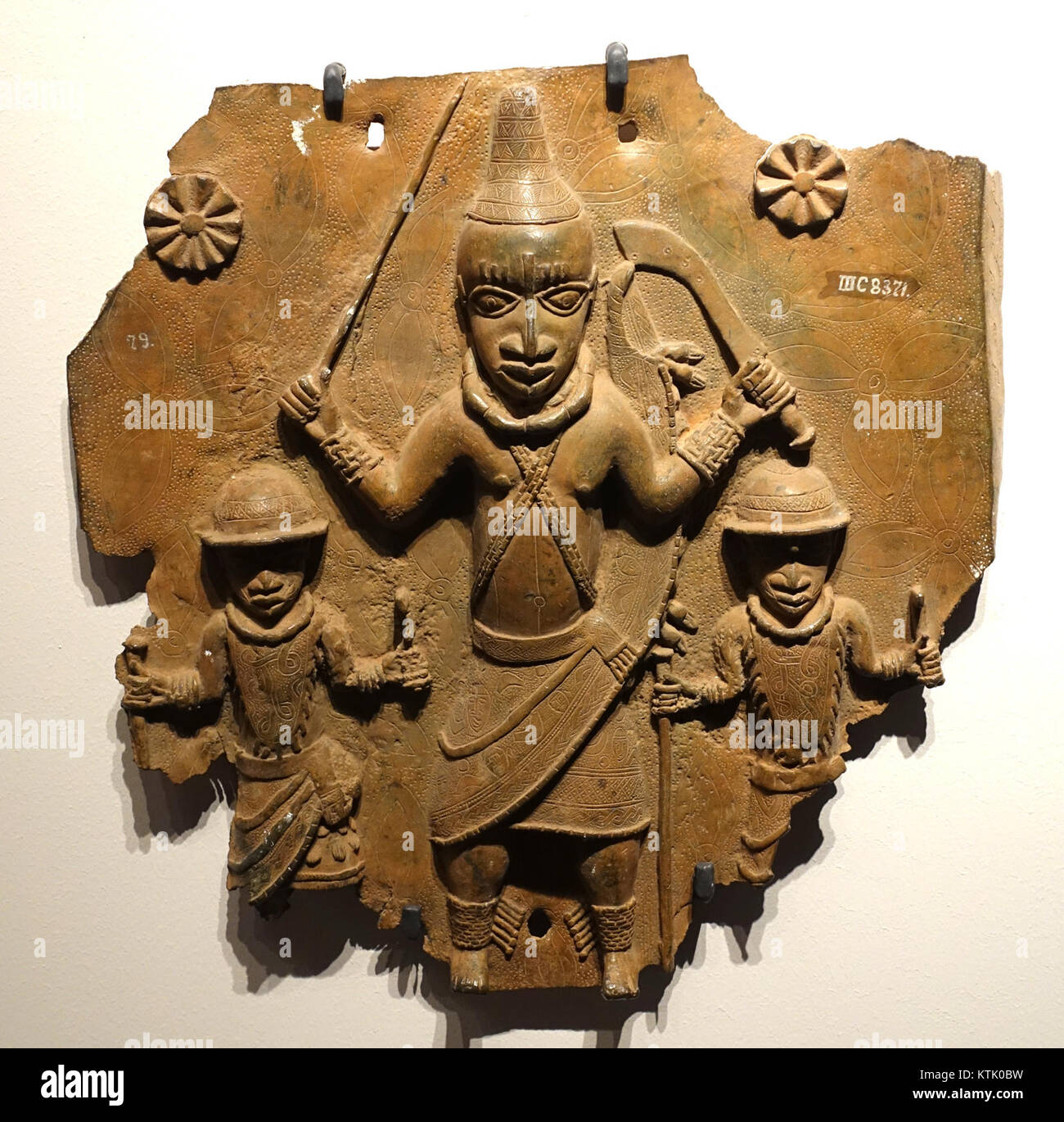 This Benin plaque, housed in the Ethnological Museum of Berlin, is an ...